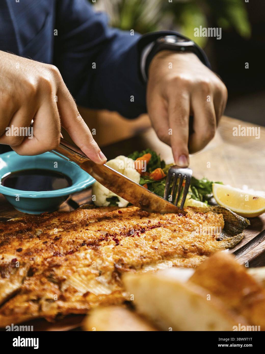 Man using fork knife having hi-res stock photography and images - Alamy