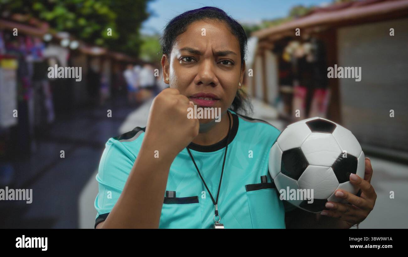 African american woman referee raises hi-res stock photography and ...