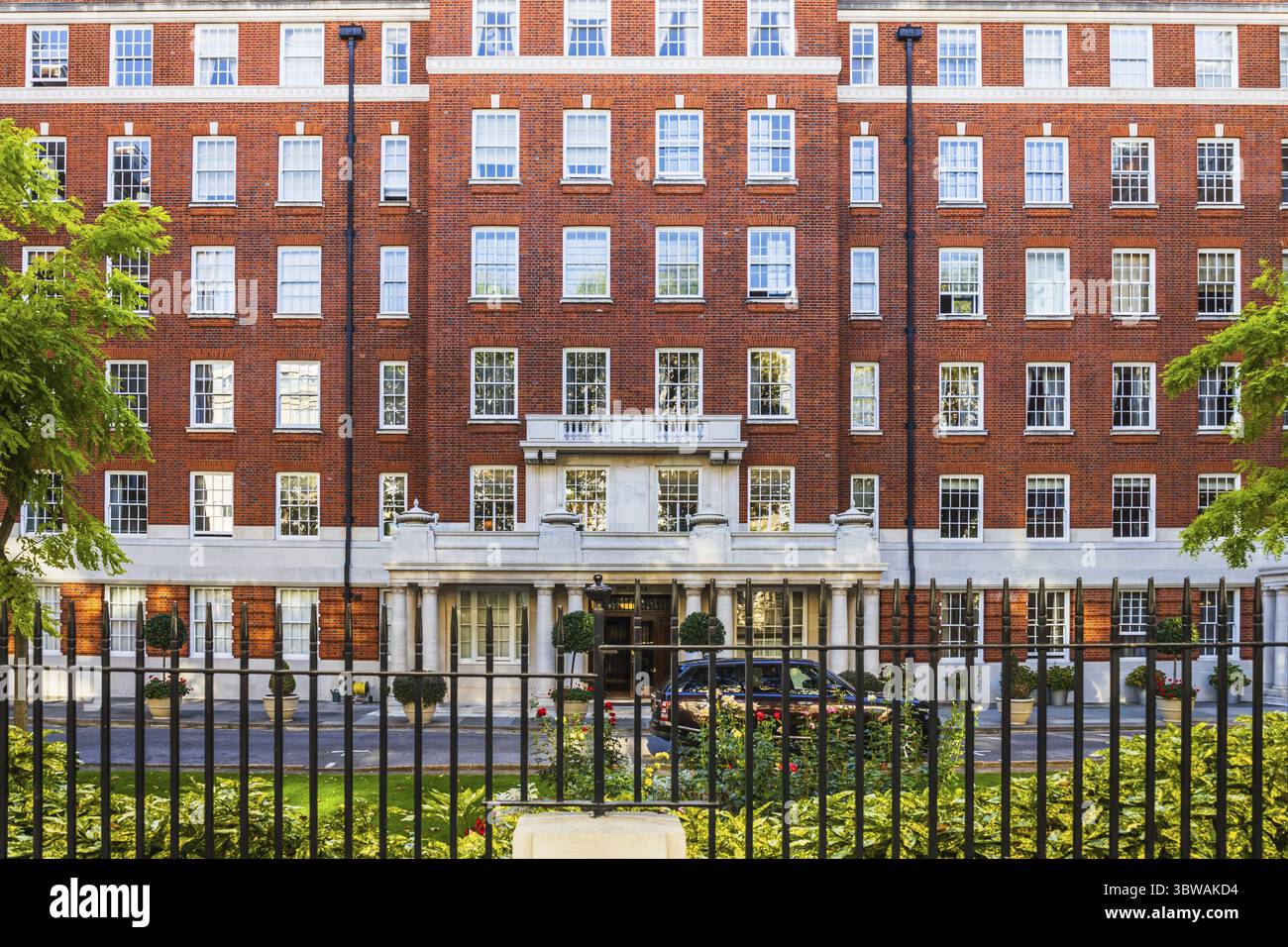 Historic red brick building with symmetrical windows, classic ...