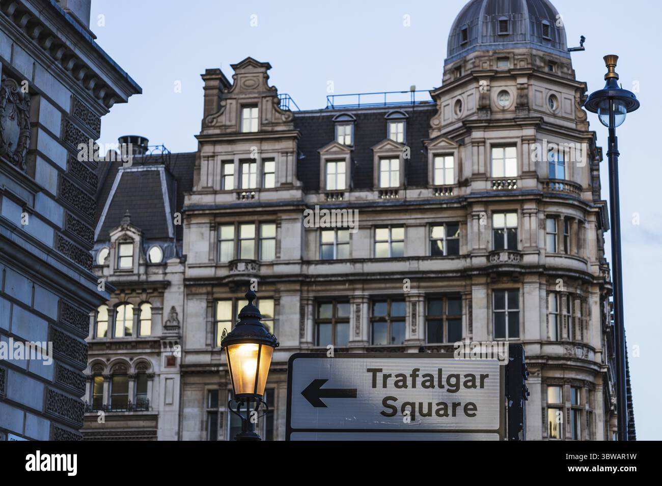 An elegant building near Trafalgar Square with a street sign, blending ...