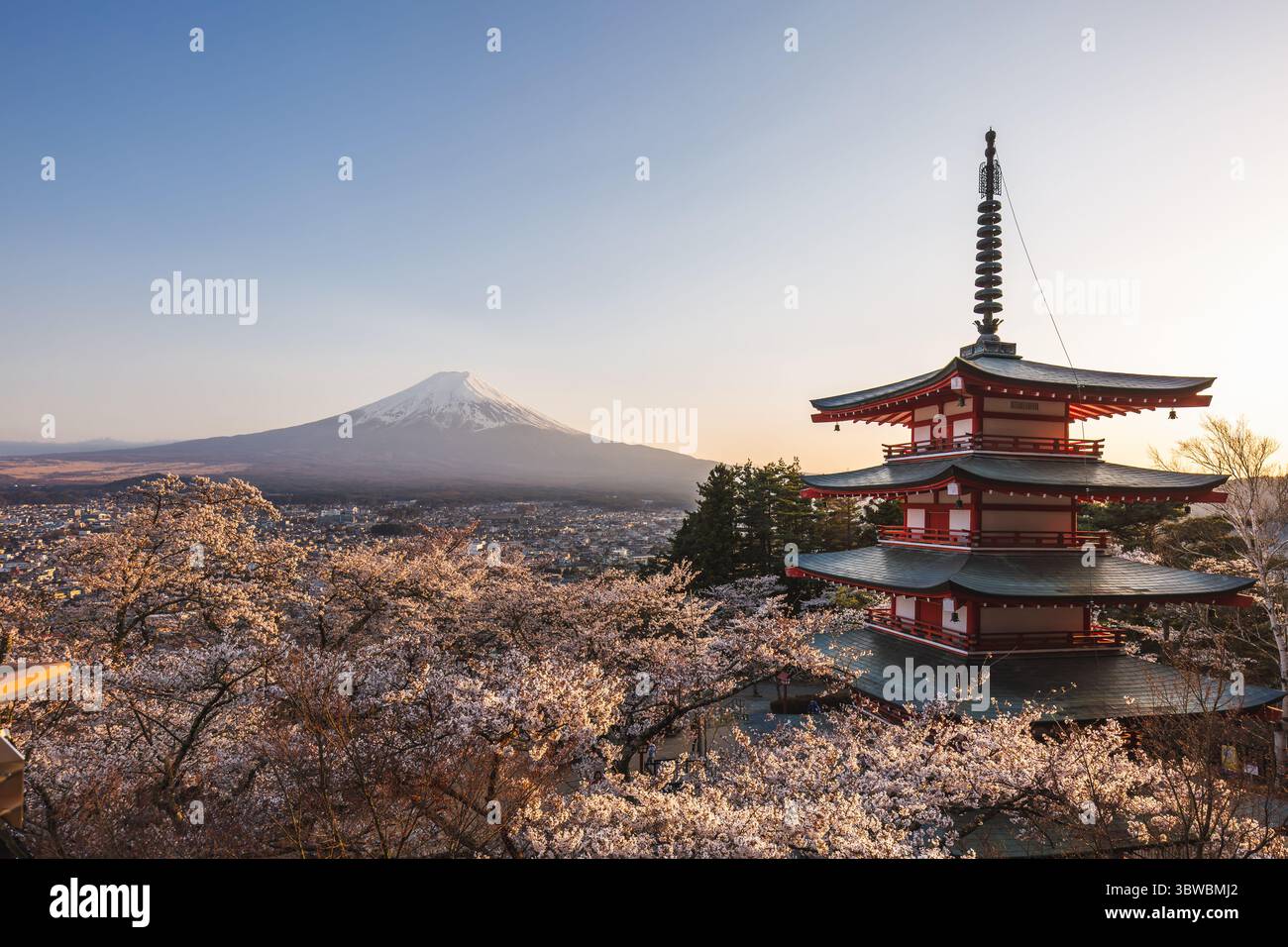 Majestic Mount Fuji, Japan, viewed from behind a stunning three-story ...
