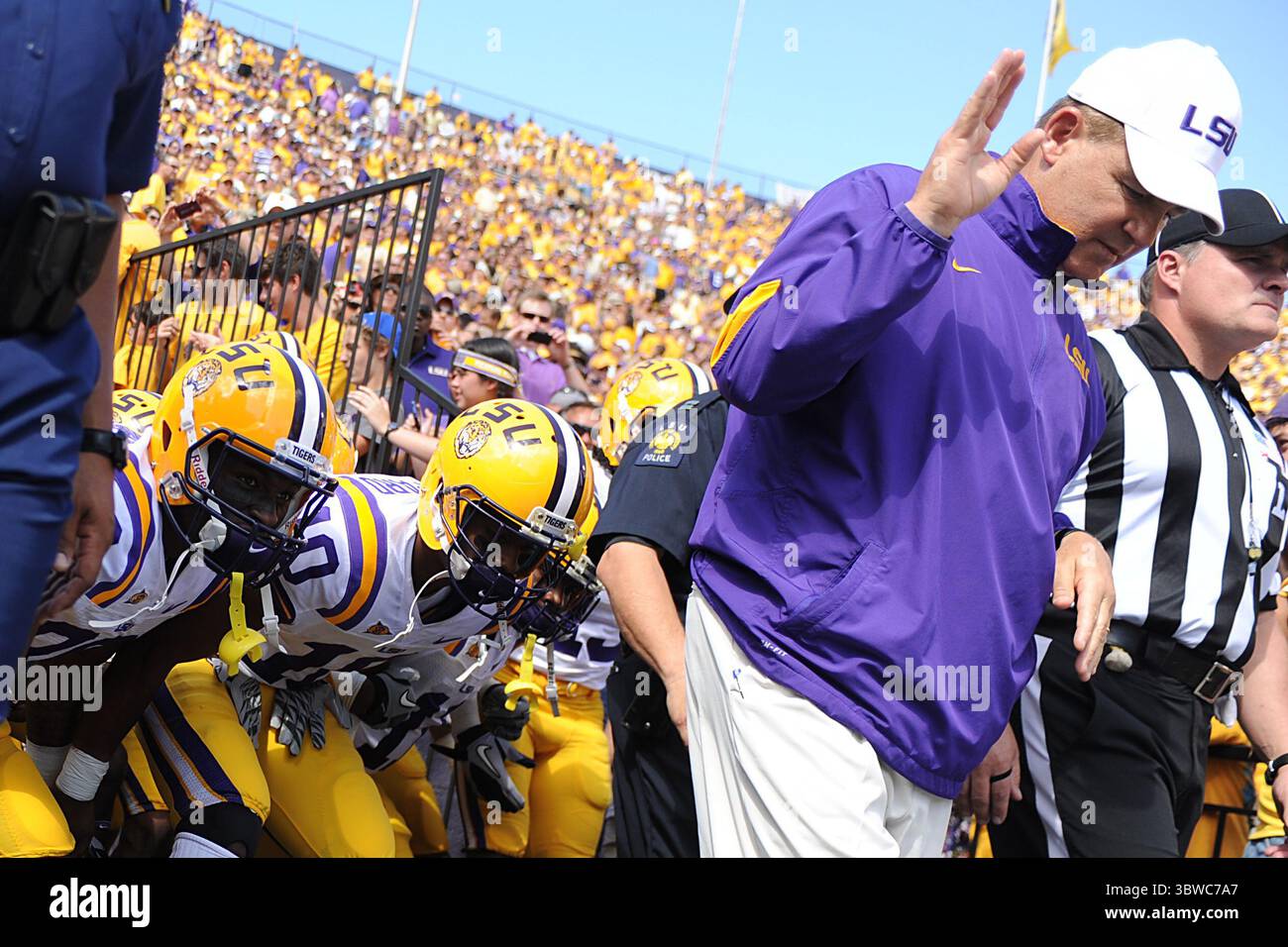 LSU Tigers head coach Les Miles leads the Tigers to the field before ...
