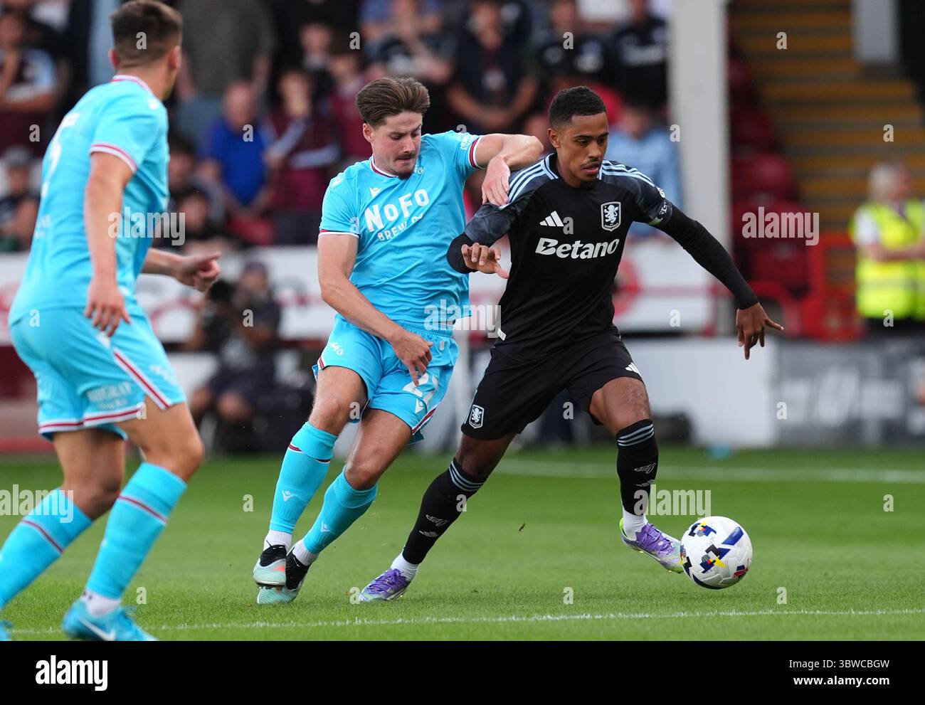 Aston Villa's Jacob Ramsey (right) and Walsall's Jamie Jellis battle ...