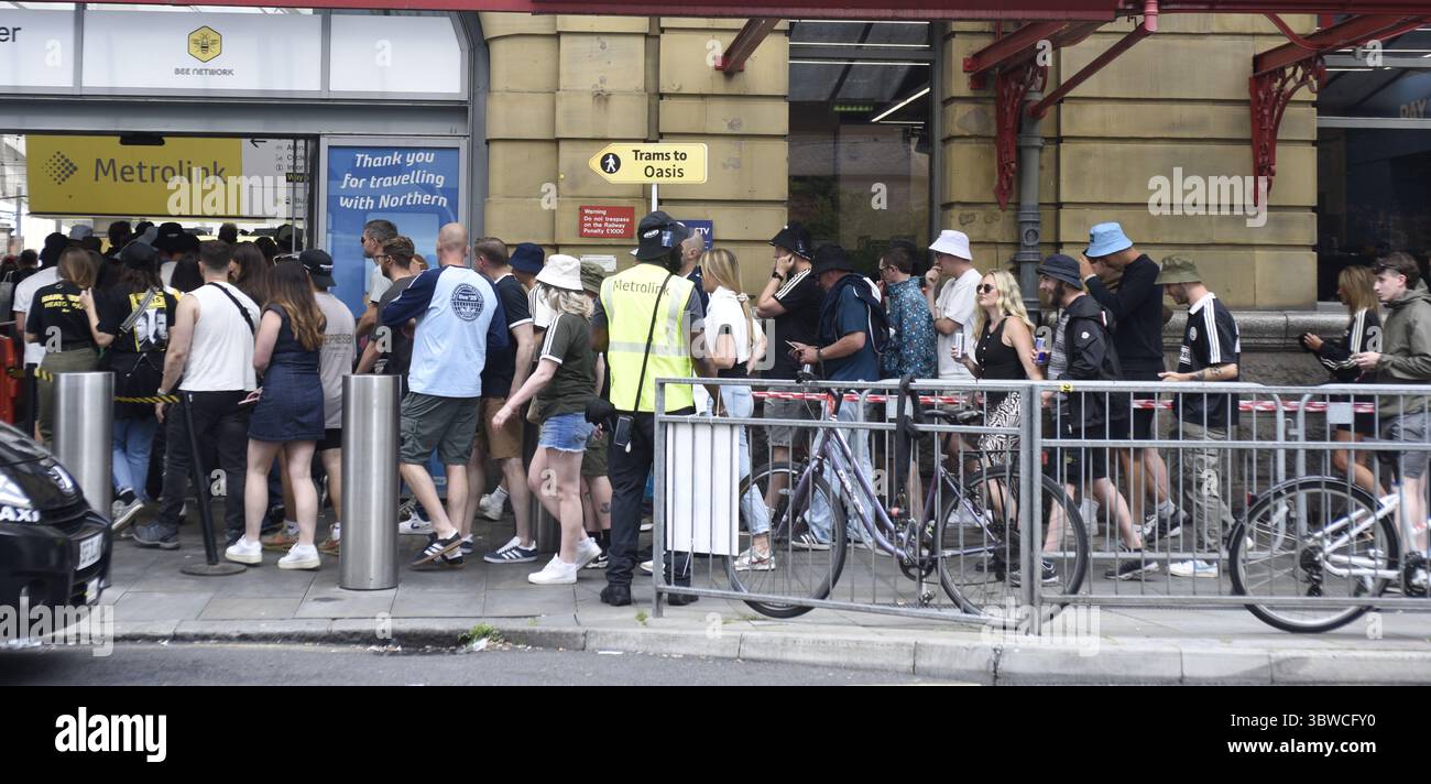 Manchester, UK, 16th July, 2025 Eager Oasis fans queue at Victoria ...