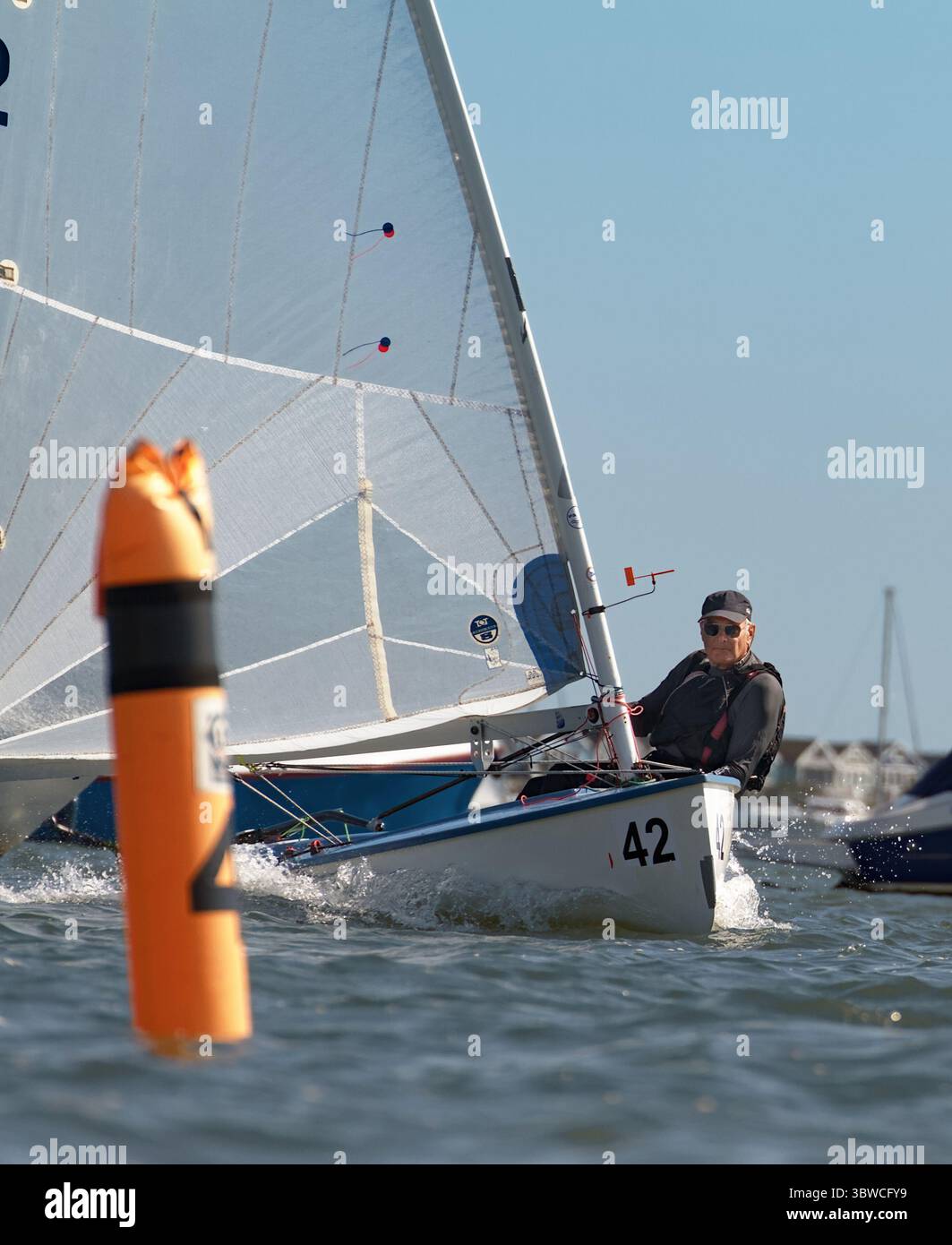 Finn Sailing Dinghy, Sailboat Approaching A Floating Inflatable ...