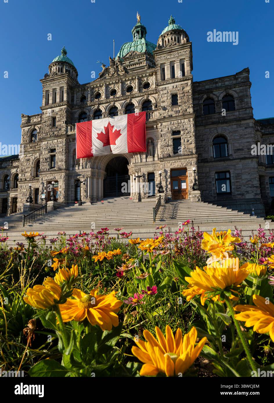 The Canadian flag on the Parliament Buildings of British Columbia in ...