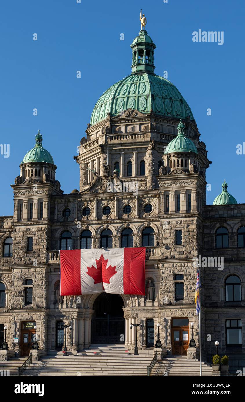 The Canadian flag on the Parliament Buildings of British Columbia in ...