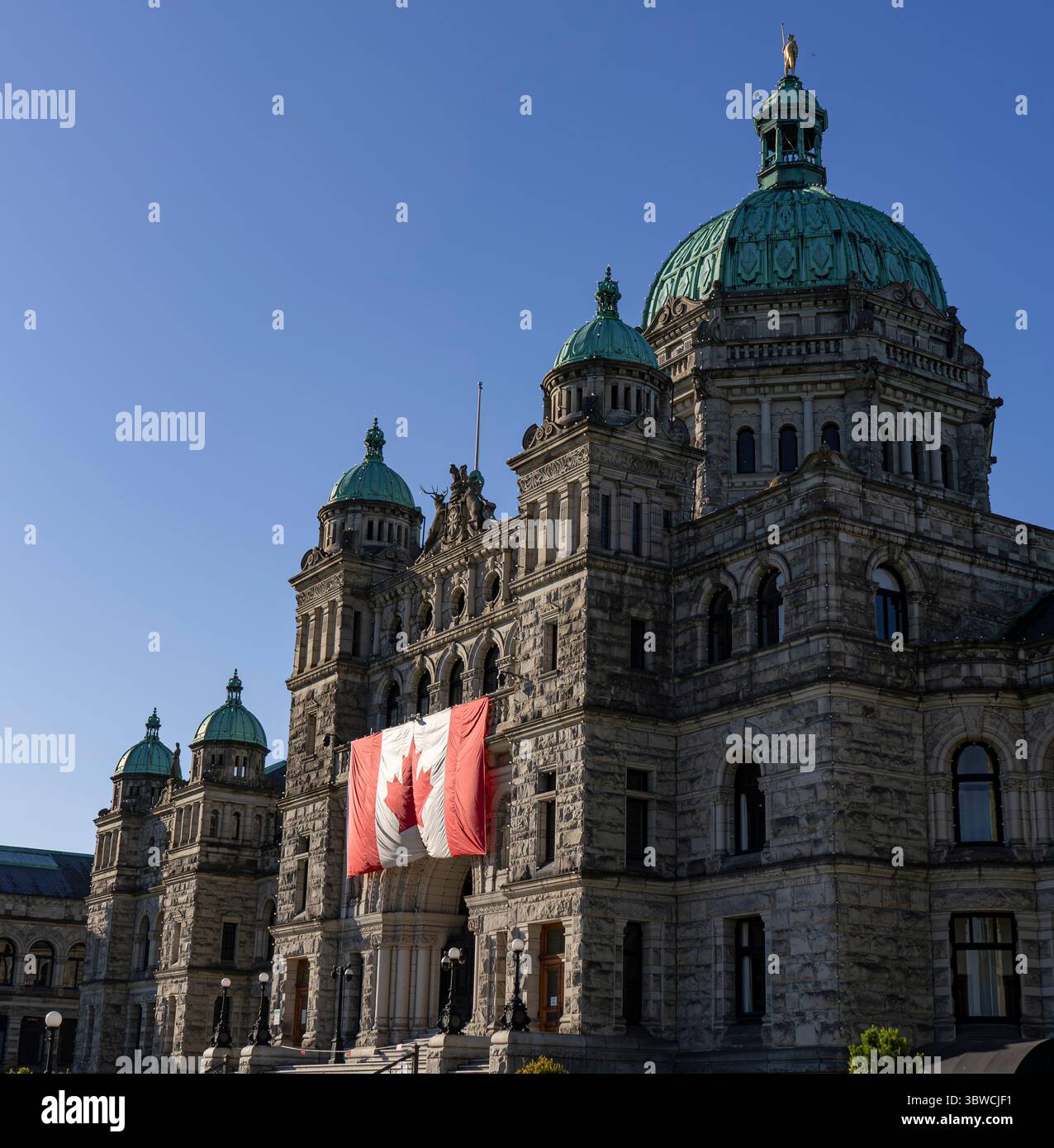 The Canadian flag on the Parliament Buildings of British Columbia in ...