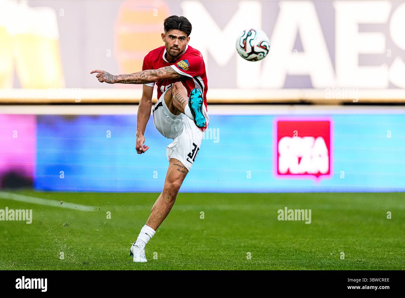 GENT, NETHERLANDS - JULY 16: Denso Kasius of AZ Alkmaar shoots during ...