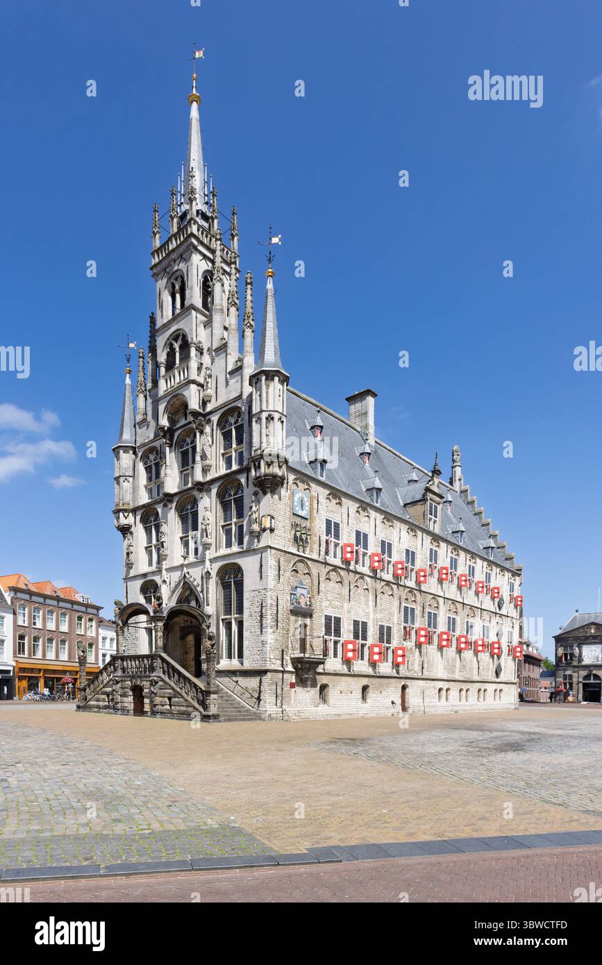 "Stunning Gothic Town Hall of Gouda, Netherlands, adorned with red ...