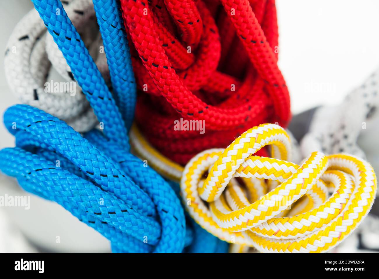 Multi-colored ropes for yachts tied together, close-up Stock Photo - Alamy