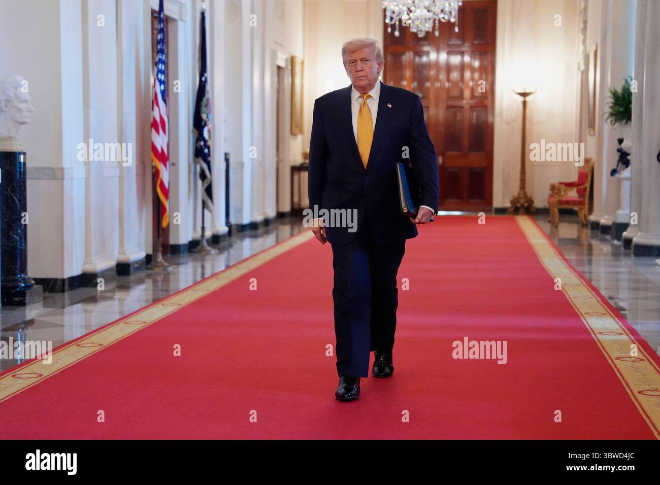 President Donald Trump arriving before speaking at a ceremony to sign ...
