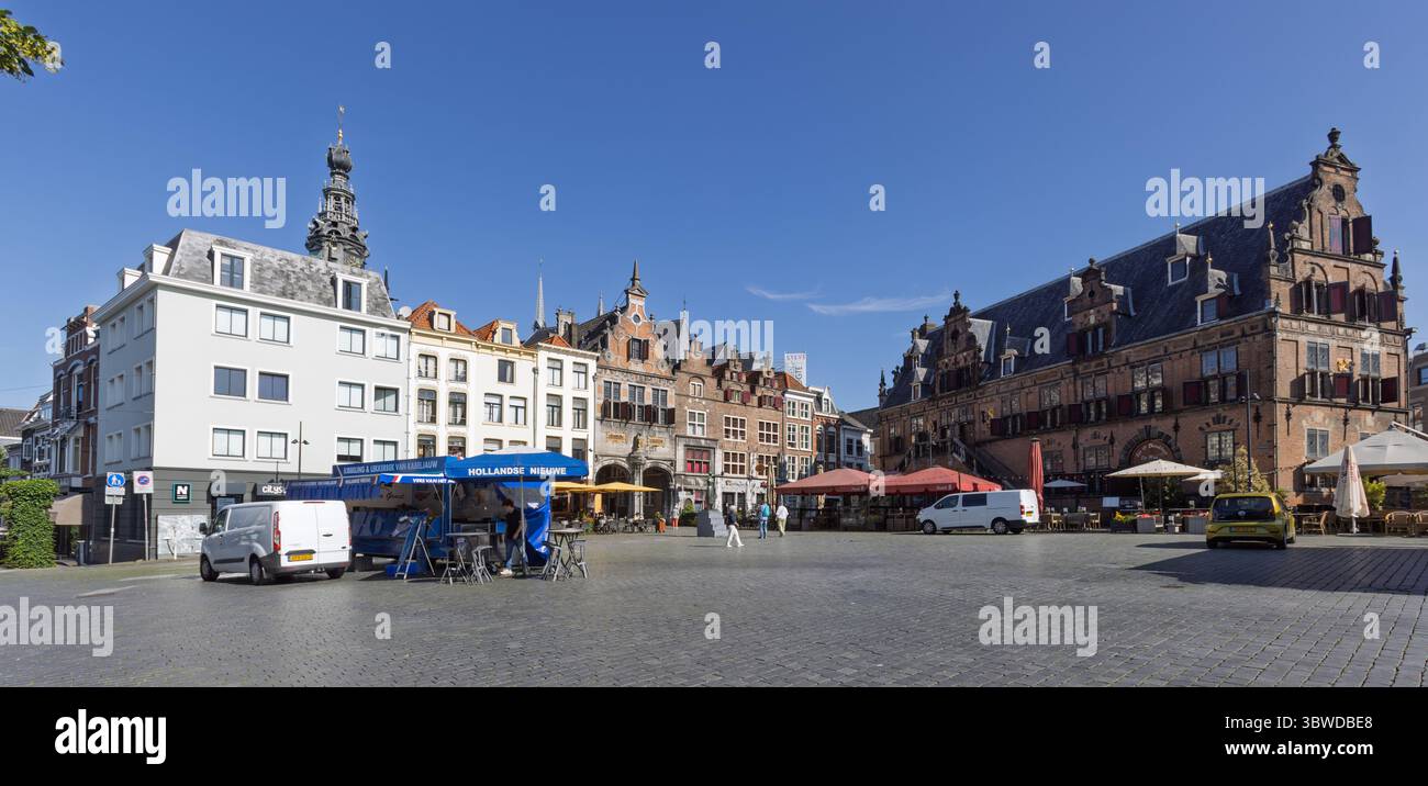 The Grote Markt in Nijmegen comes alive under a clear sky, showcasing ...