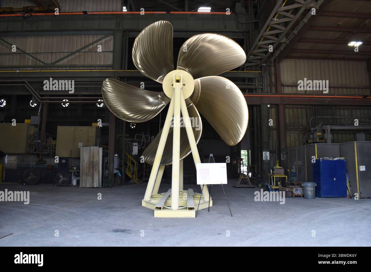 An aircraft carrier propeller, weighing 64,000 lbs., (29,030 kgs ...