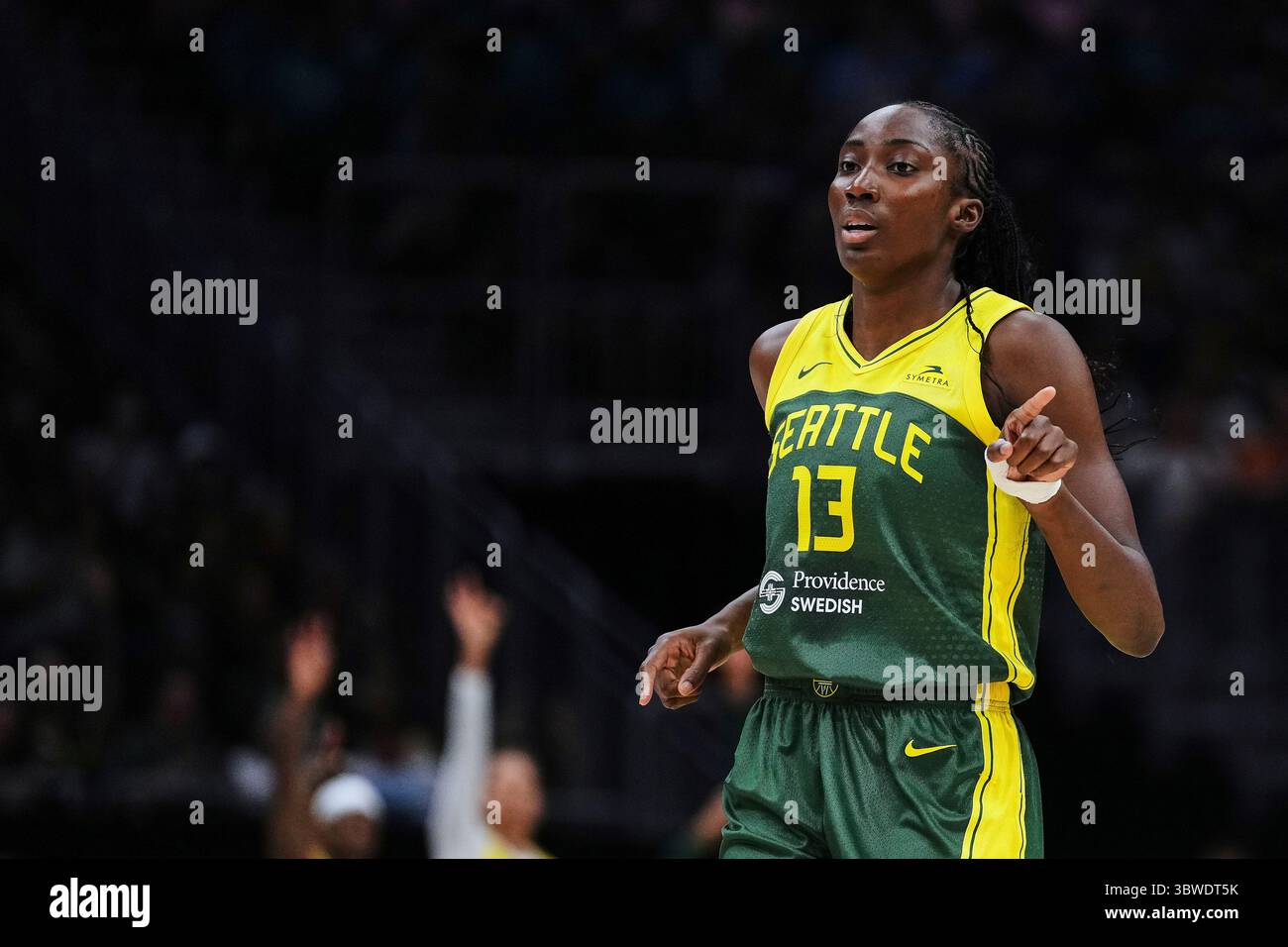 Seattle Storm forward Ezi Magbegor reacts to making a basket against ...