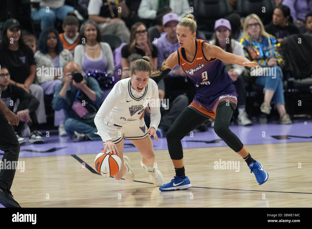 Golden State Valkyries guard Kate Martin (20) felling after being ...