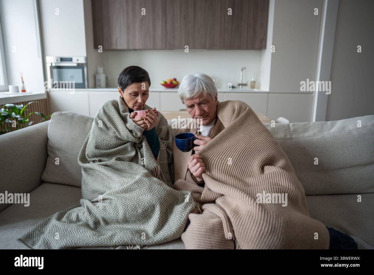 Home disease shivering woman family hi-res stock photography and images ...