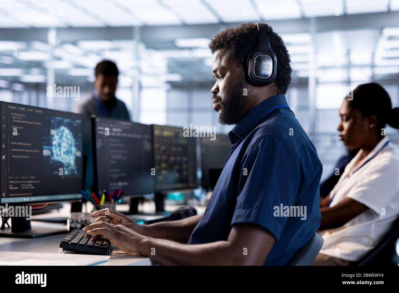Server farm IT specialist listening music while doing AI research ...