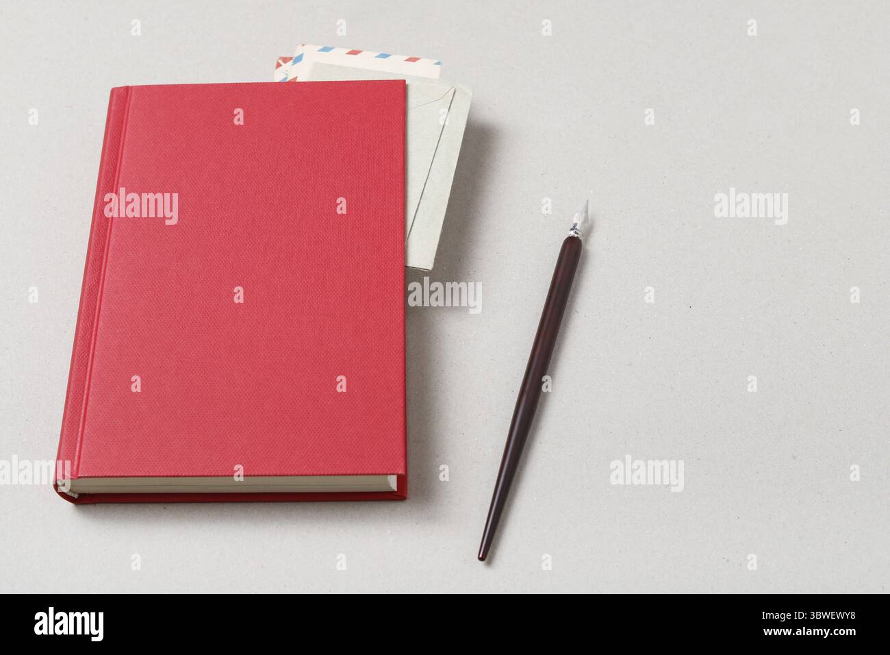 Big red book isolated on grey background, copy space. Graphic resources ...