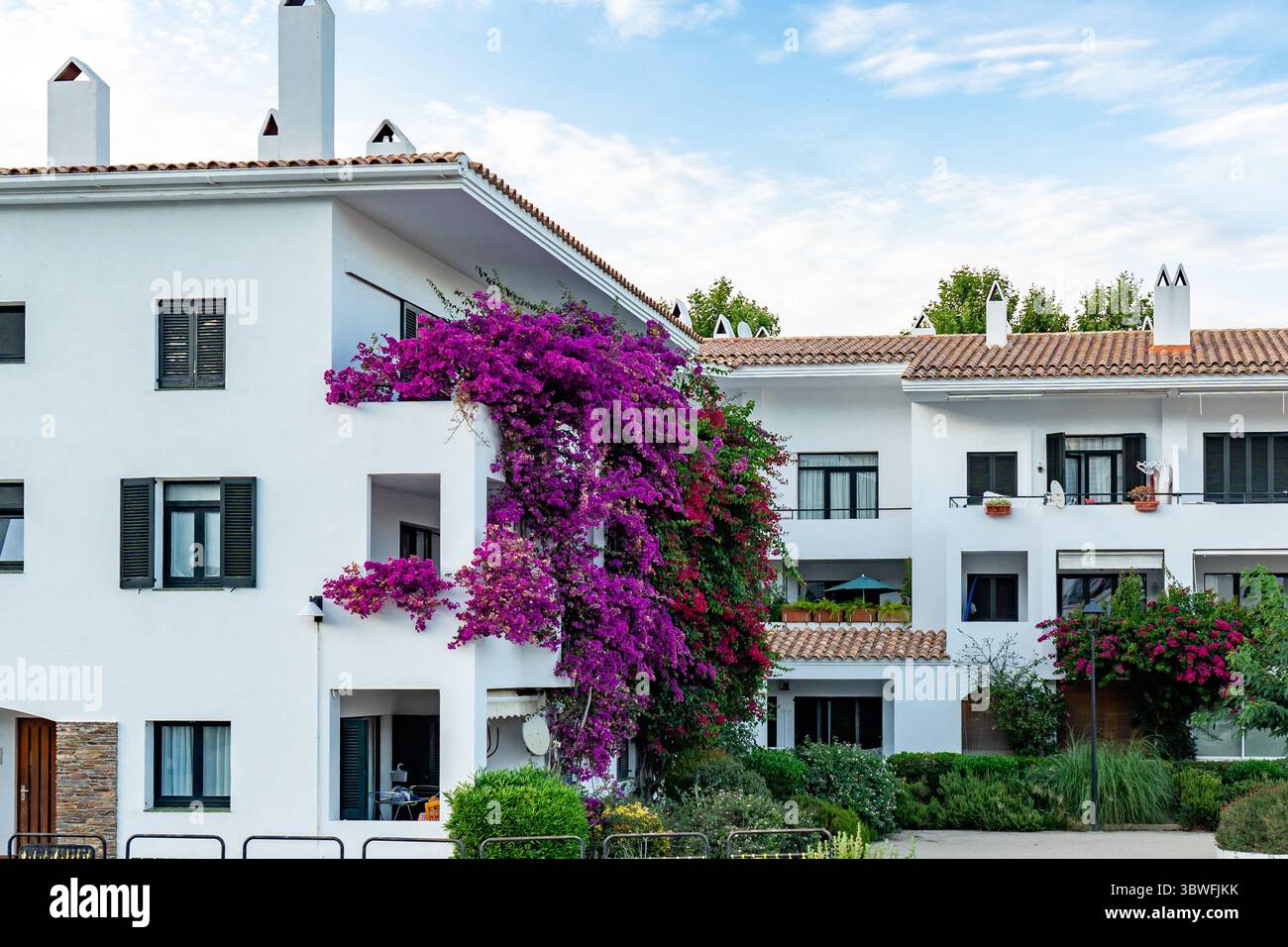 Mediterranean white apartment buildings in charming neighborhood on the ...