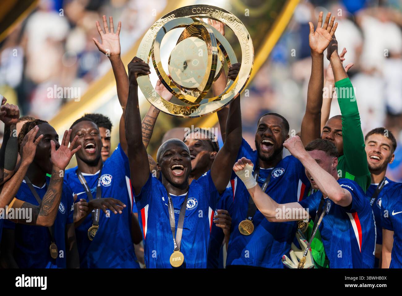Moises Caicedo of Chelsea FC lifts the trophy during the award ceremony ...
