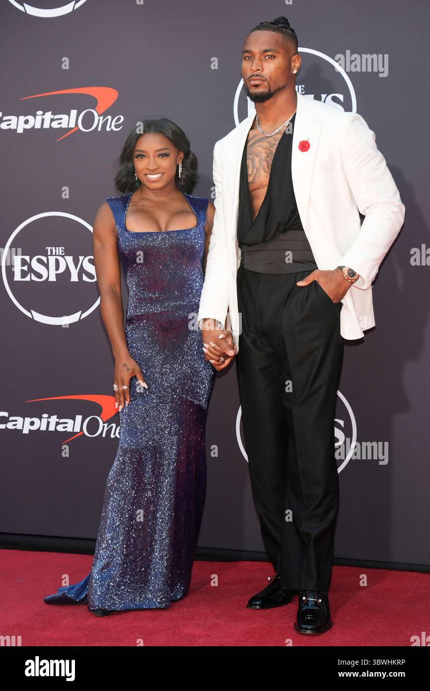 Simone Biles, left, and Jonathan Owens arrive at the ESPY Awards at the Dolby Theatre in Los ...