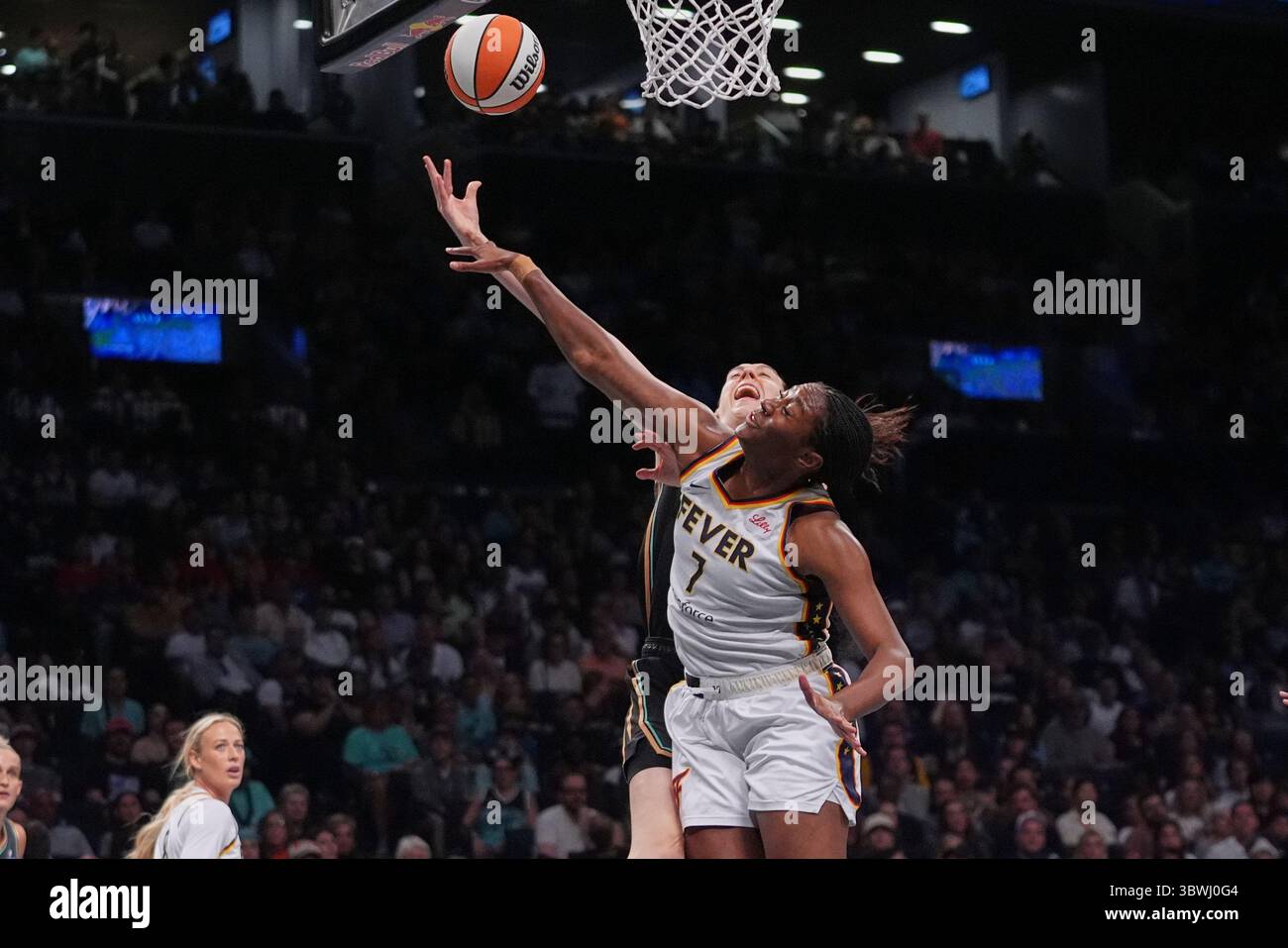Indiana Fever's Aliyah Boston (7) defends New York Liberty's Breanna ...