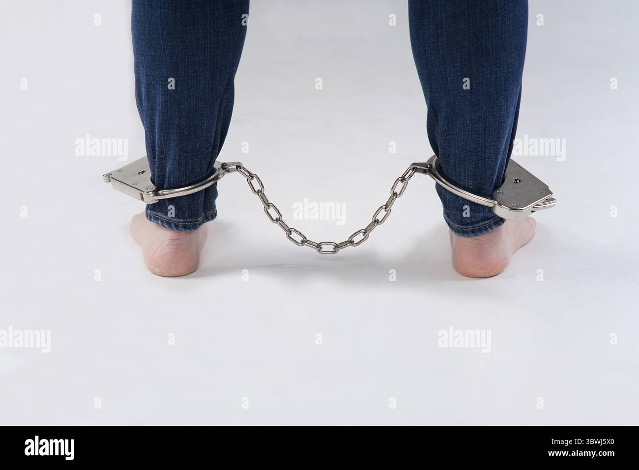 Feet in leg irons hi-res stock photography and images - Alamy