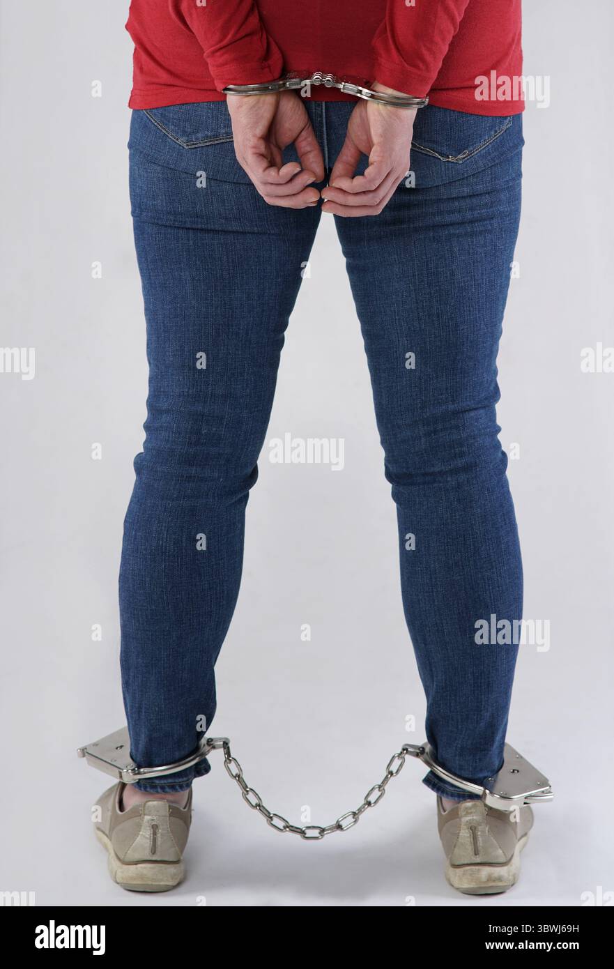 Woman with handcuffs hi-res stock photography and images - Alamy