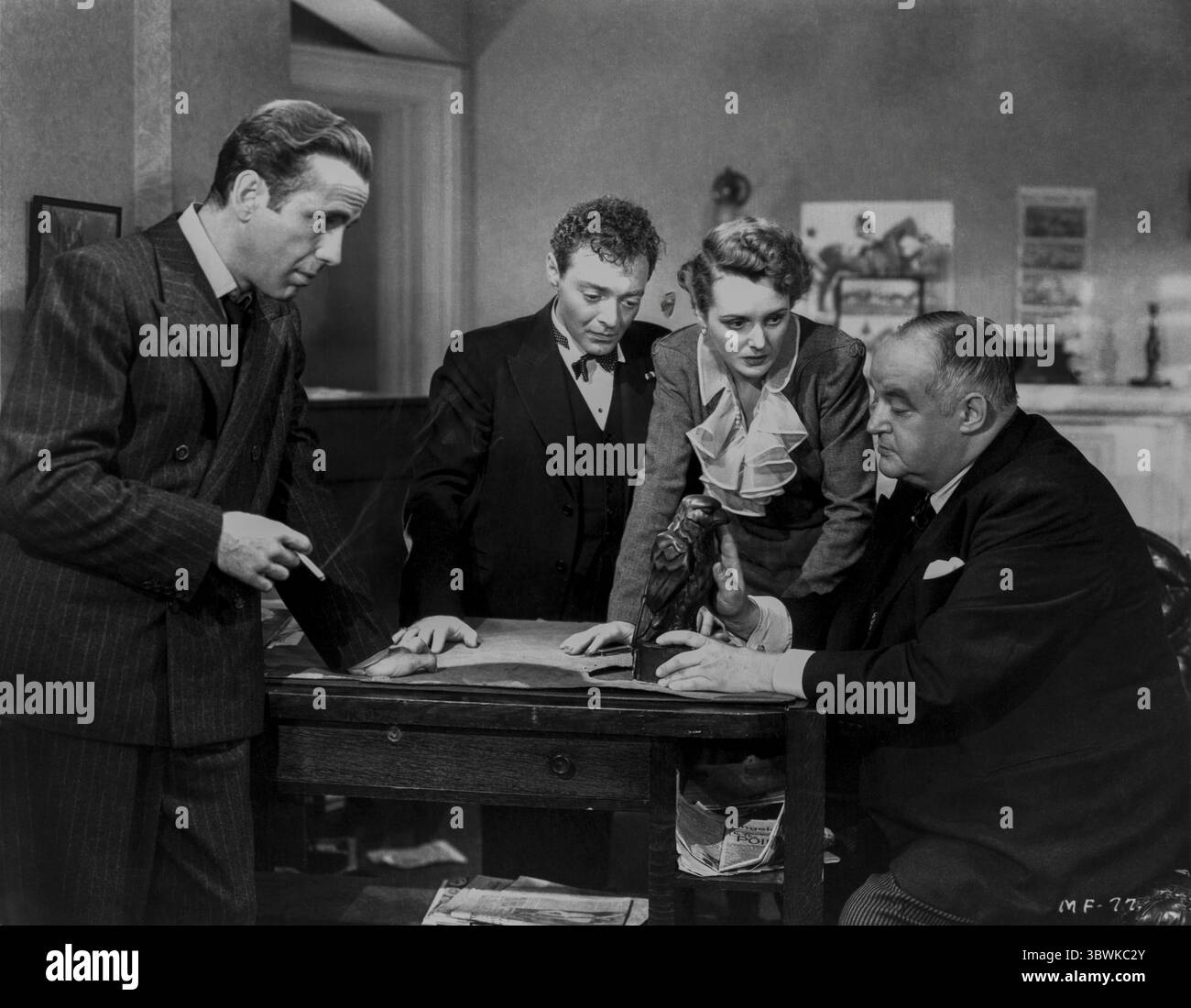 Film still of Humphrey Bogart and co stars in the Maltese Falcon ...