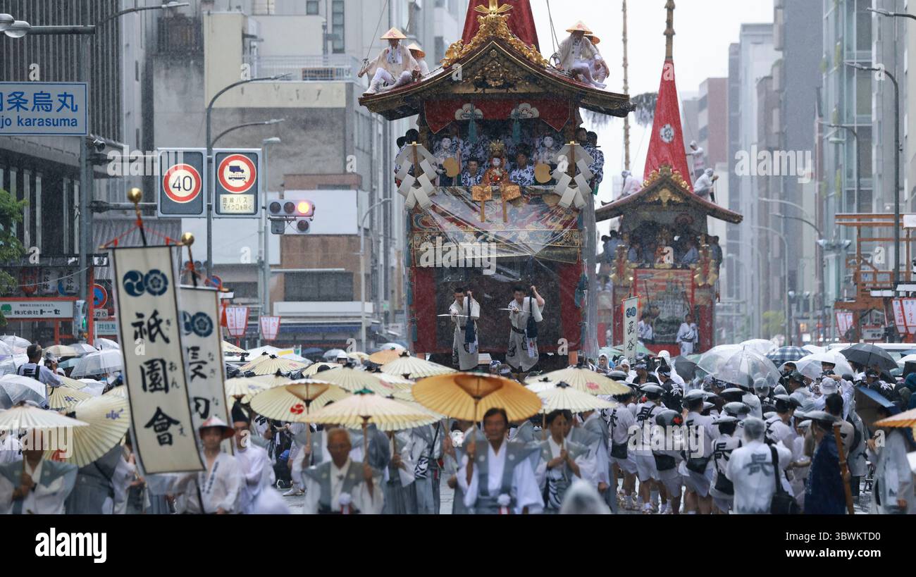 Gorgeous floats called Yama Hoko in Japanese parade while raining ...