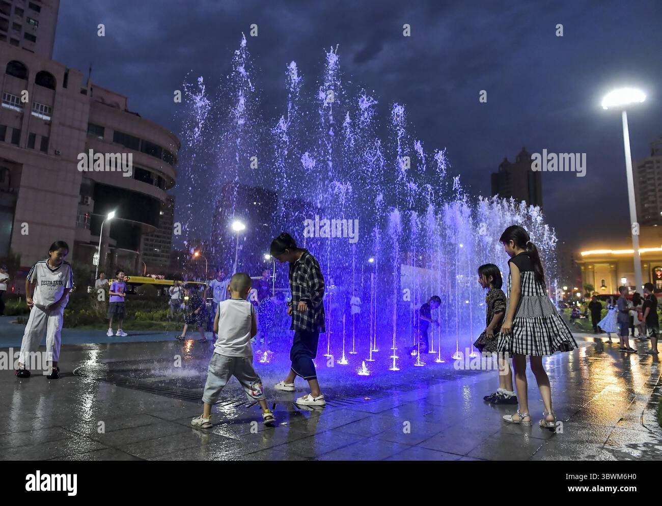 **CHINESE MAINLAND, HONG KONG, MACAU AND TAIWAN OUT** Children play ...