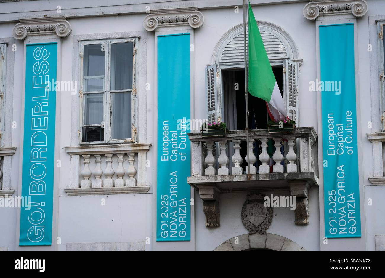 PRODUCTION - 16 July 2025, Italy, Gorizia: Banners at the town hall ...