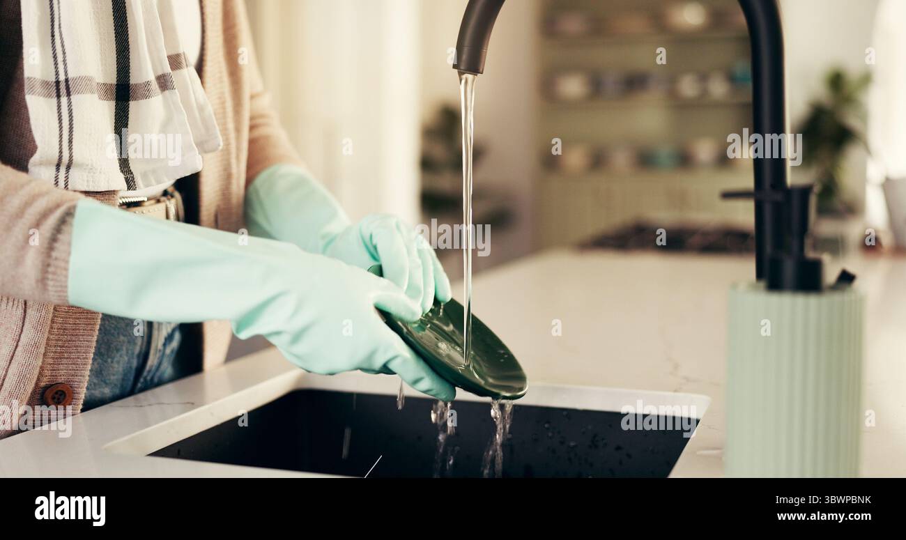 Cleaning, water and hands of person in kitchen for washing dishes ...