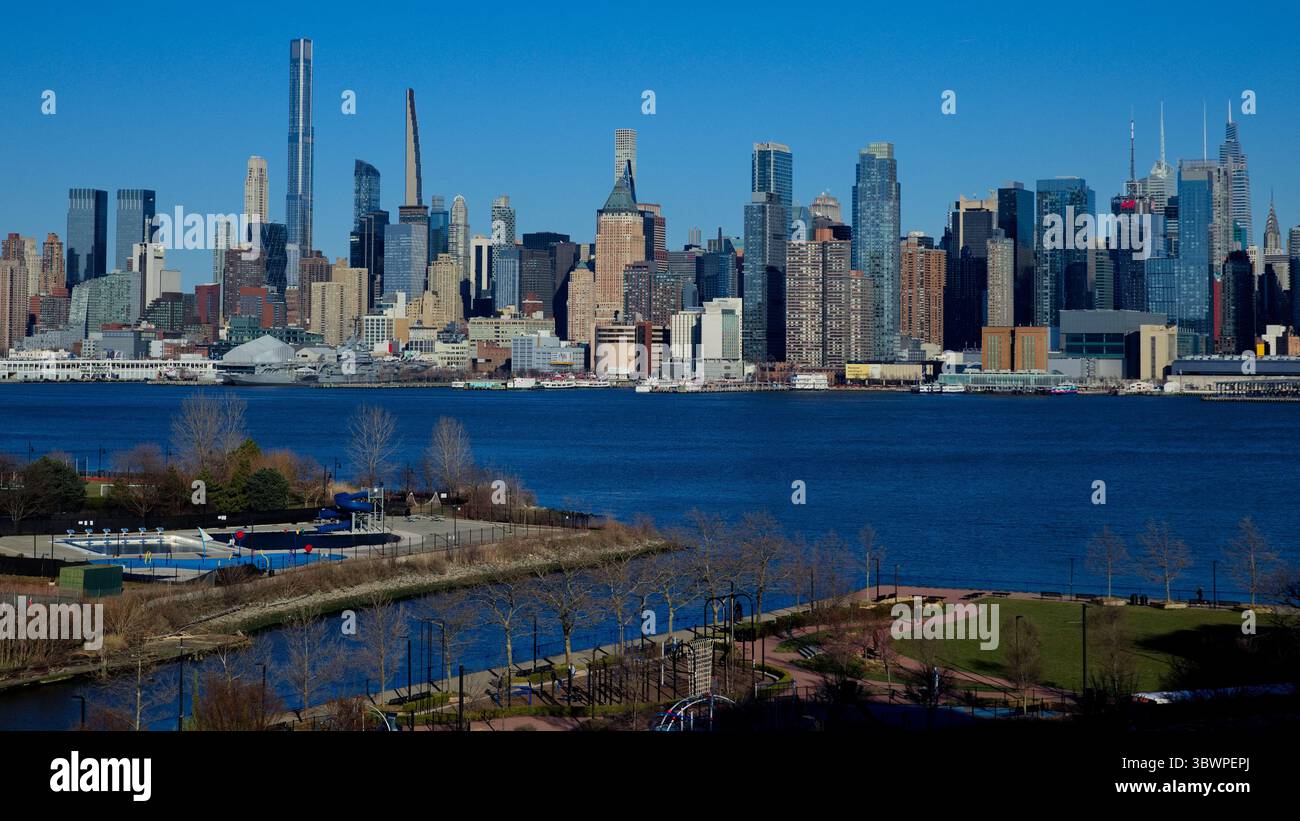 Morning sun illuminates Manhattan’s vibrant dynamic skyline across the ...