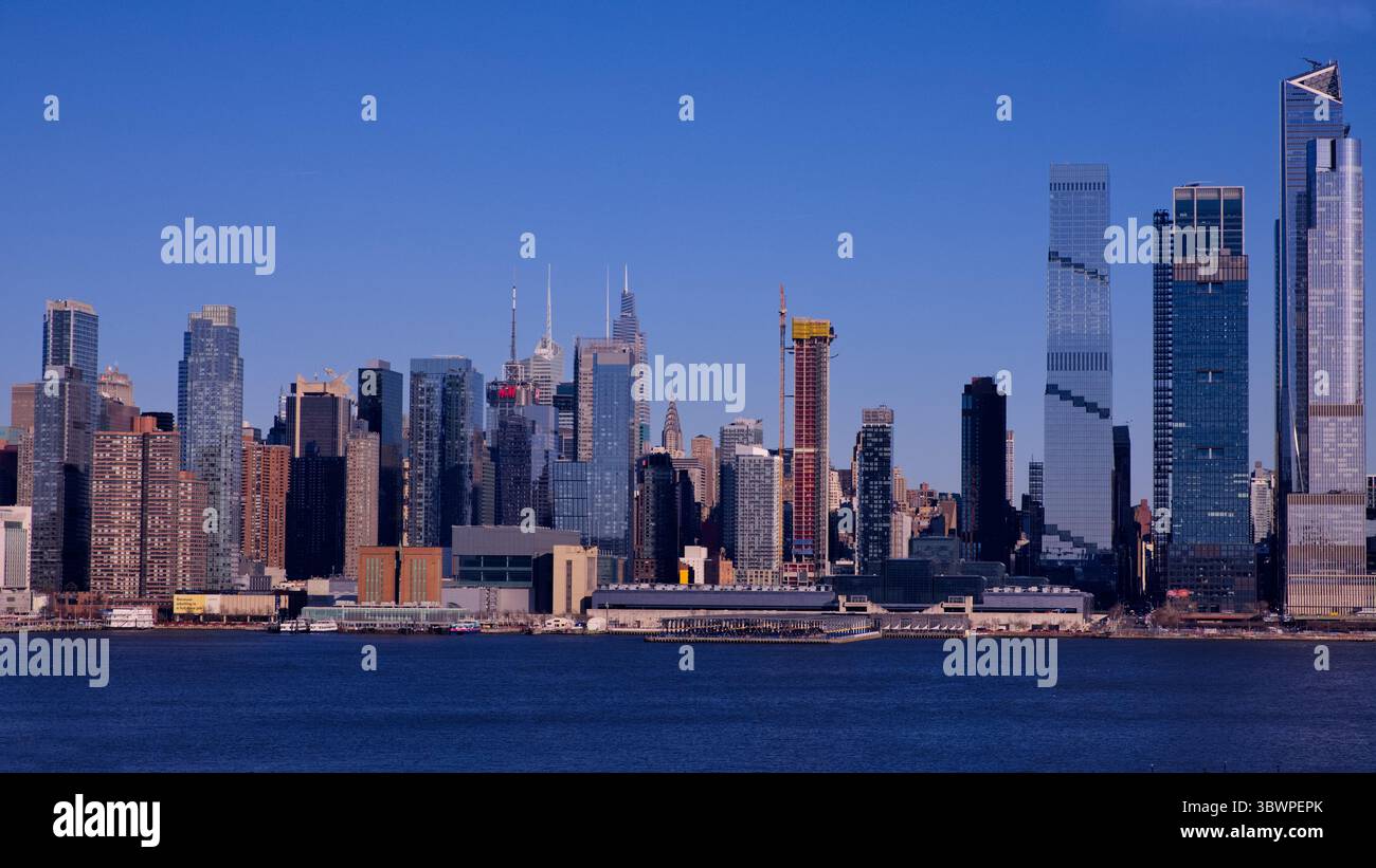 Daylight view of Manhattan’s gleaming skyscrapers across the Hudson ...