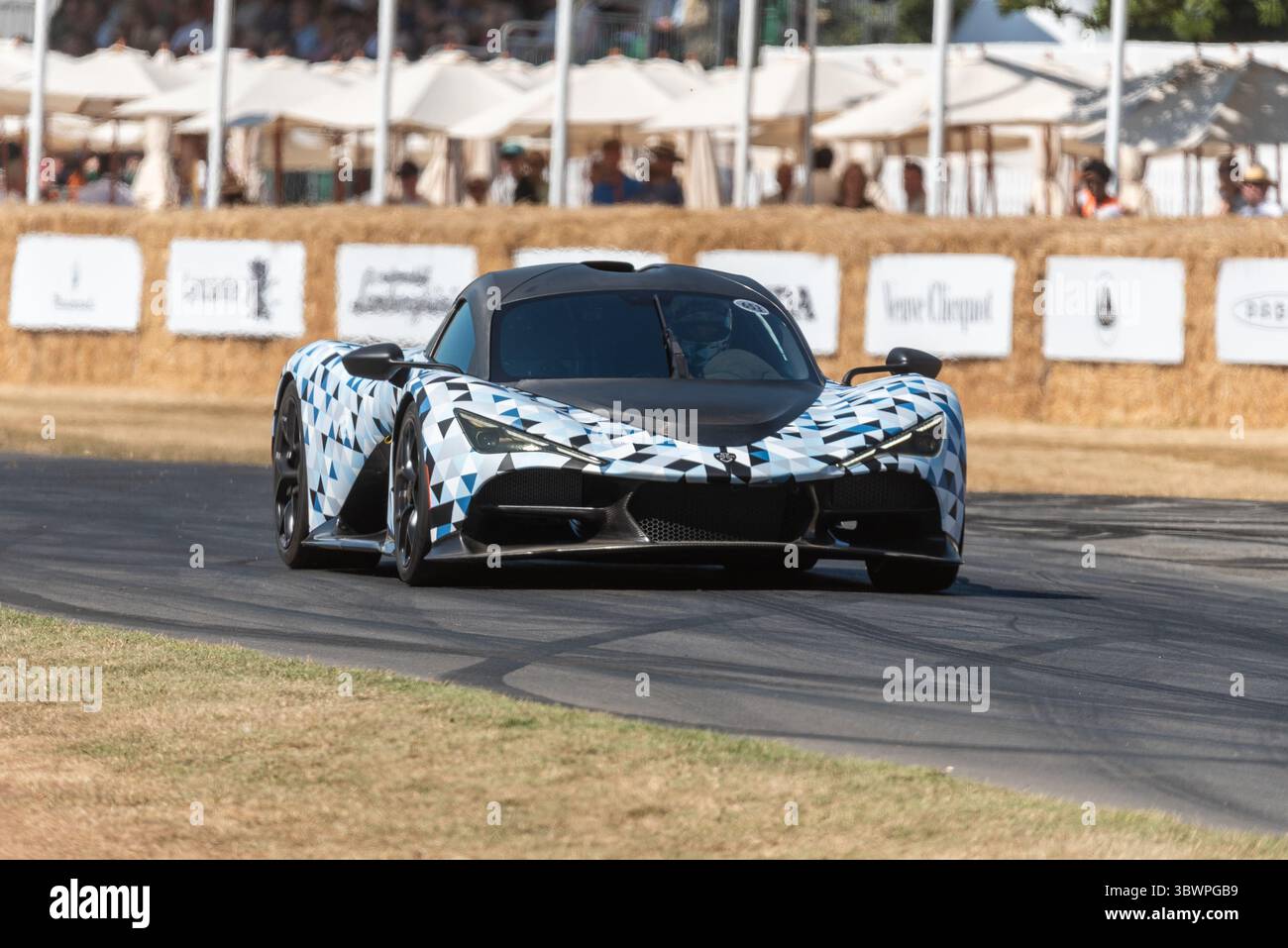 Zenvo Aurora Tur sports car driving up the hillclimb track at the ...