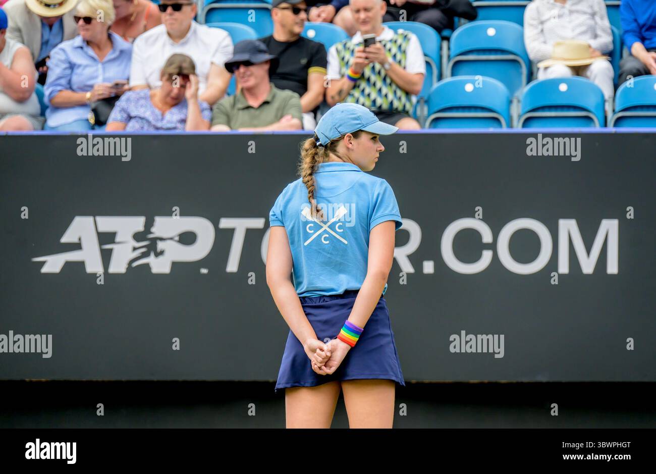 Lexus Eastbourne Open tennis 2025. Ball girl on Centre Court wearing a ...