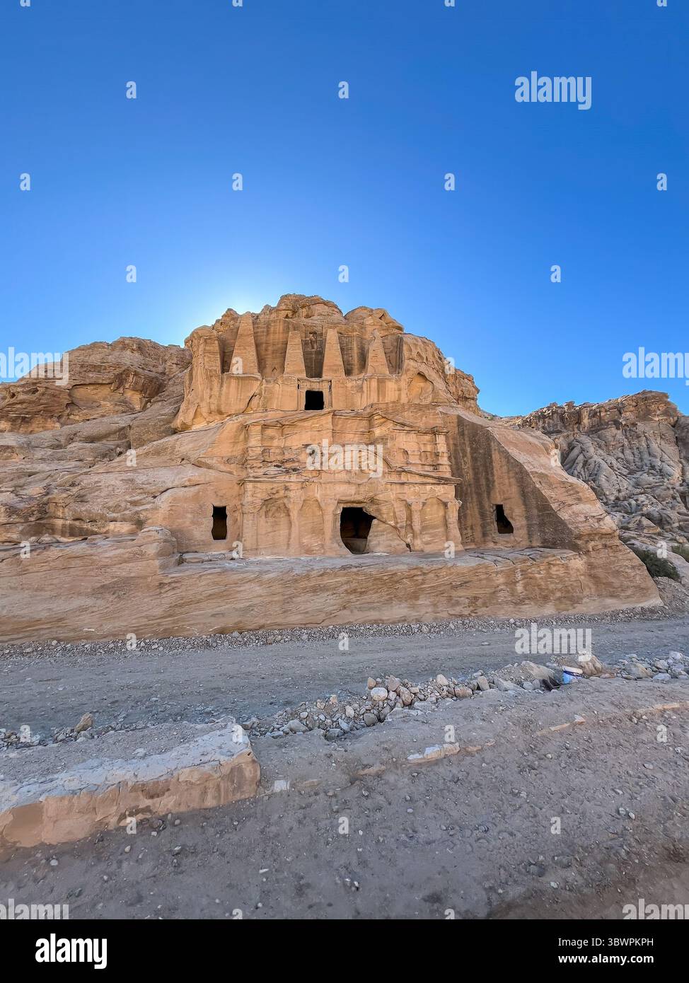 Rock-cut Nabataean tomb in Petra, Jordan, with detailed facades and ...