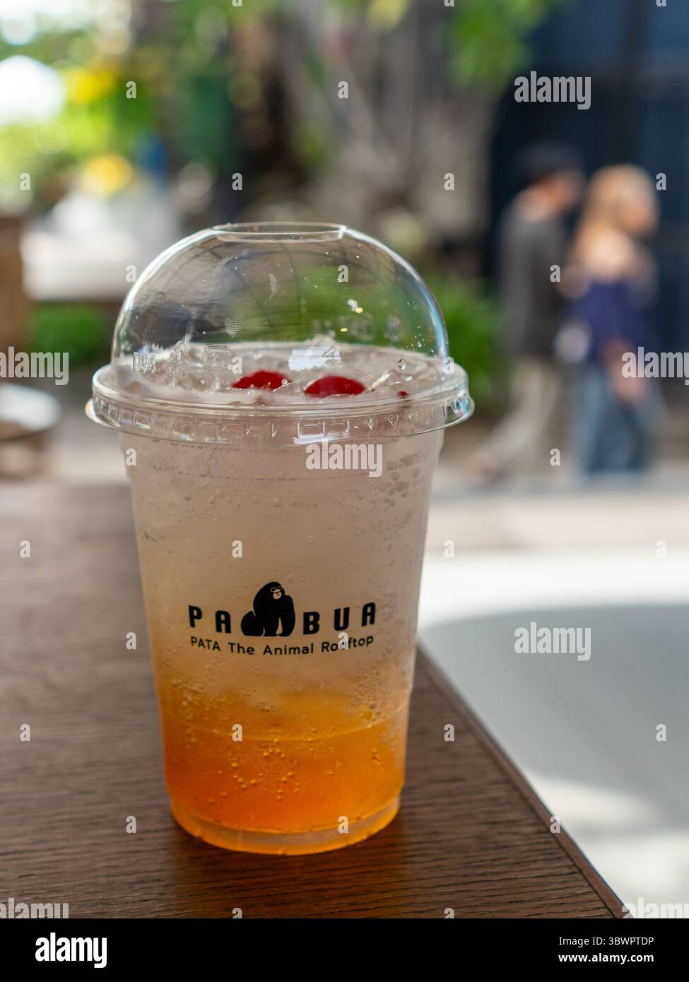 A drink from the Pata Zoo Bar with stickers bearing the image of Bua ...