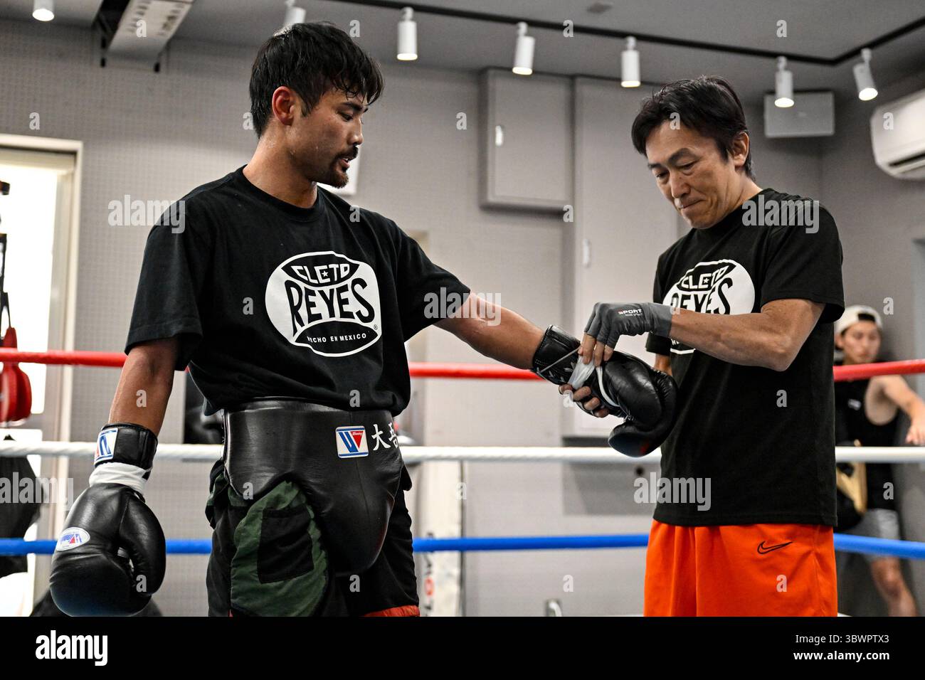 Daigo Higa of Japan and trainer Joji Nogi during a public workout in Hachioji, Tokyo, Japan on ...