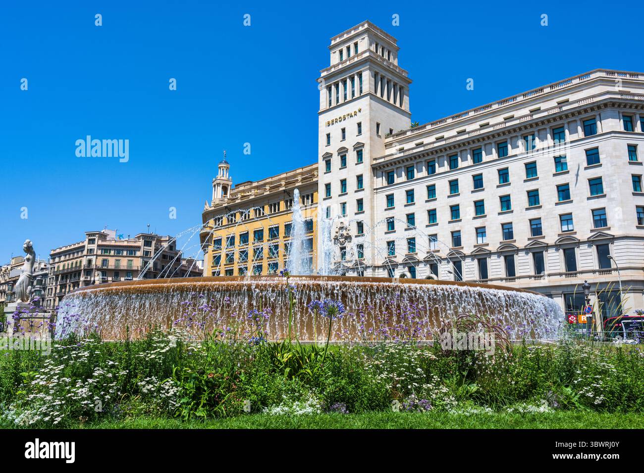 Fountains and sculptures in Plaça de Catalunya in the Eixample district ...