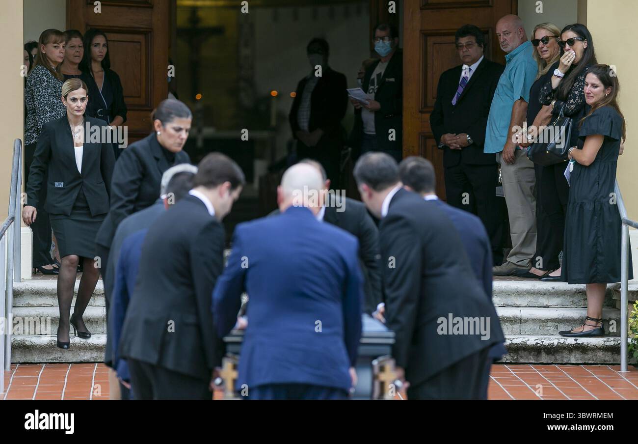 July 6, 2021, Miami, Fl: Pallbearers wheel the casket of Marcus Guara ...