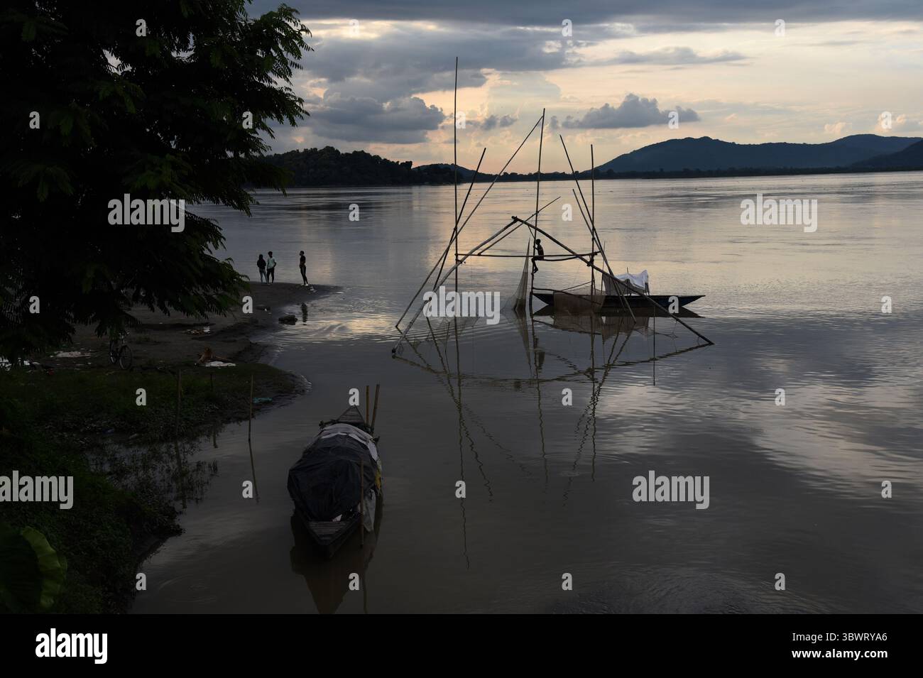 July 8, 2021, Guwahati, Guwahati, India: Indian fisherman spread his ...
