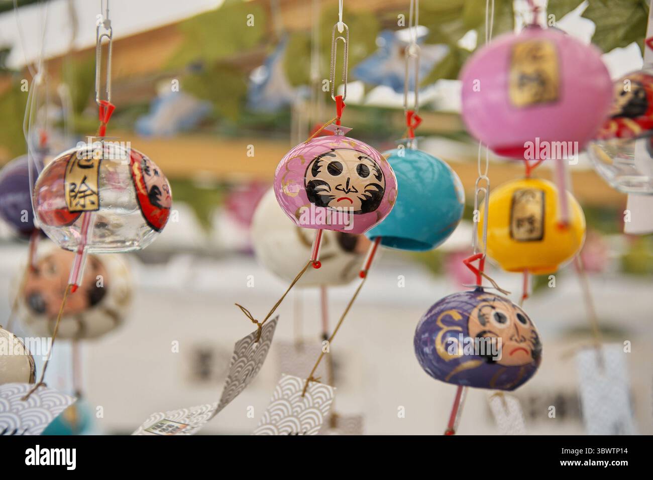 Various varieties of Wind chimes are displayed during the opening day ...