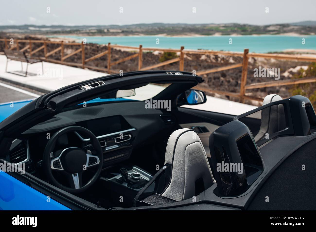 Modern luxury convertible car at the parking with a beautiful view ...