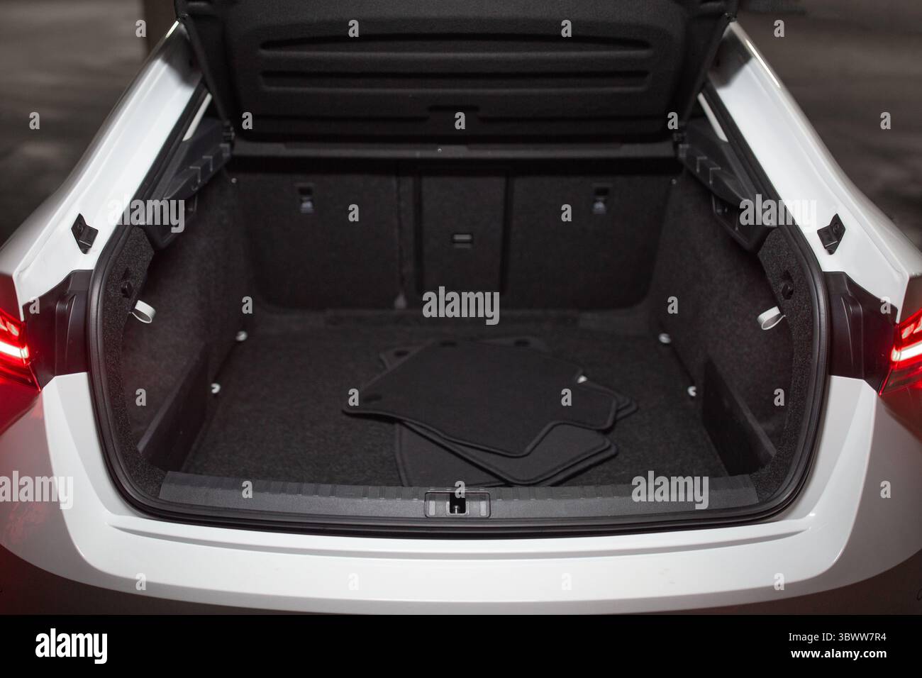 Modern sedan car have an open trunk. The car boot is open and ready for ...
