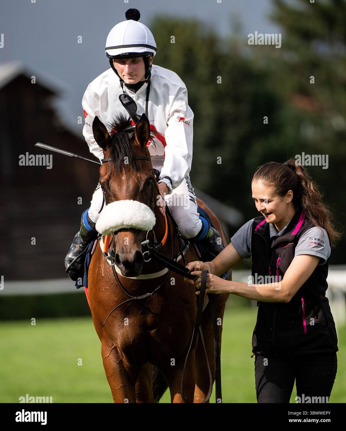 July 17, 2021, Prague, CZE: Jockey MICHAL HROUDA pats DAKOTA after ...
