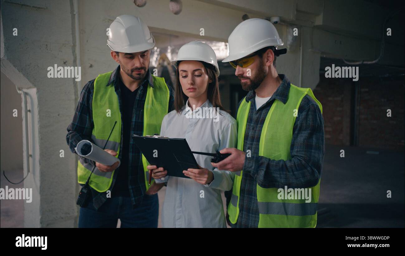 Professional Caucasian colleagues team discussing building in construction guys technicians ...