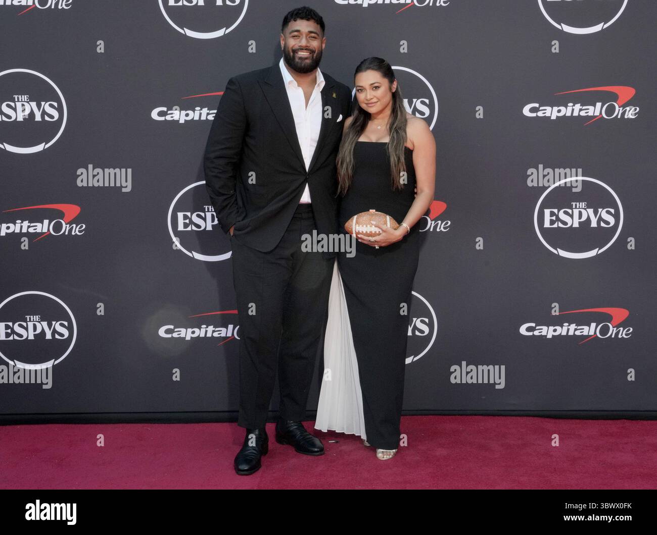 (L-R) Jordan Mailata and Nikki Mailata arrives at The 2025 ESPYS held ...